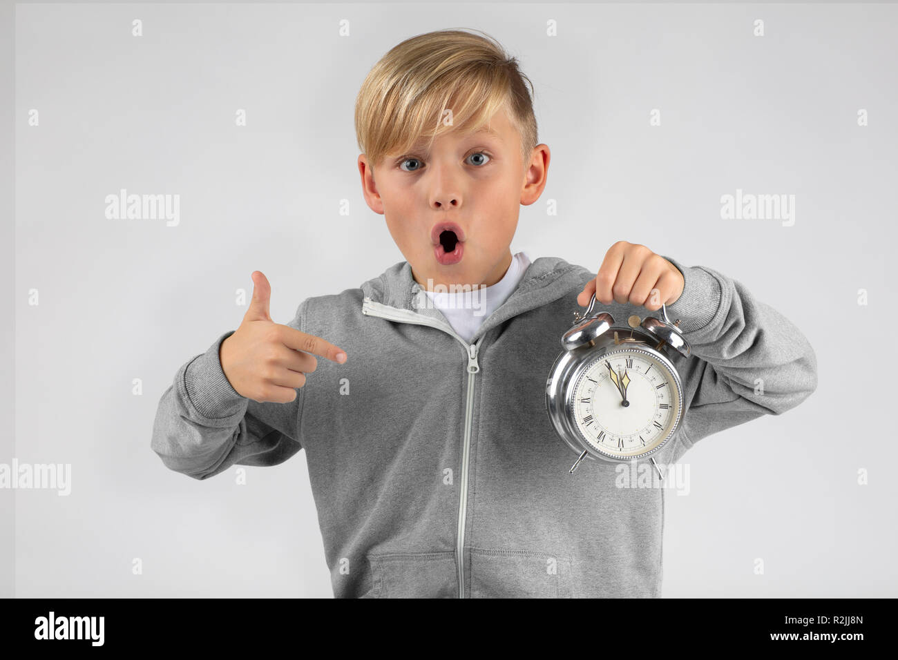 Boy pointing at sign hi-res stock photography and images - Alamy
