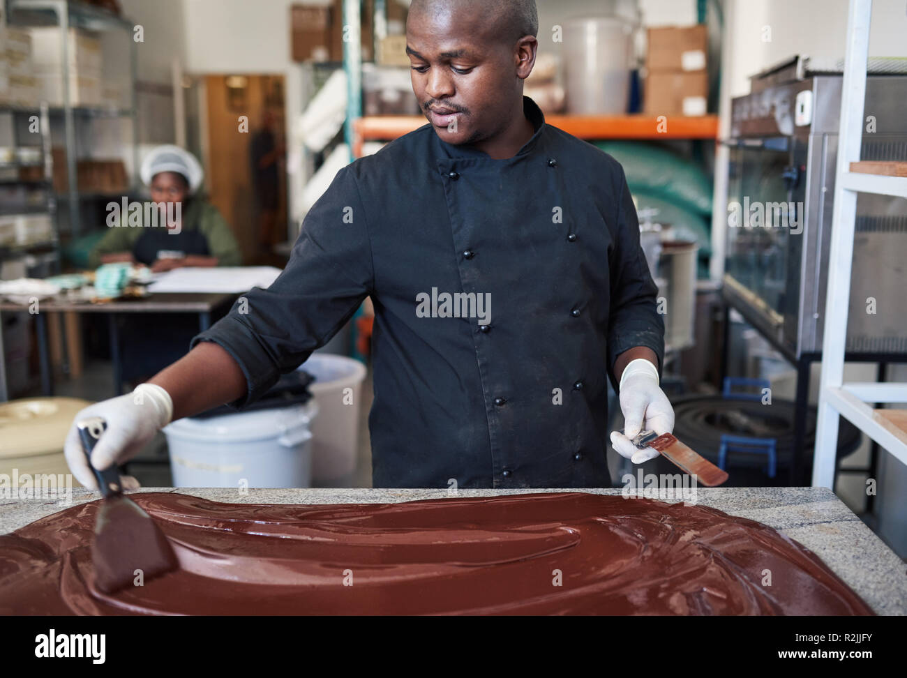 Mixing chocolate at a factory hi-res stock photography and images - Alamy