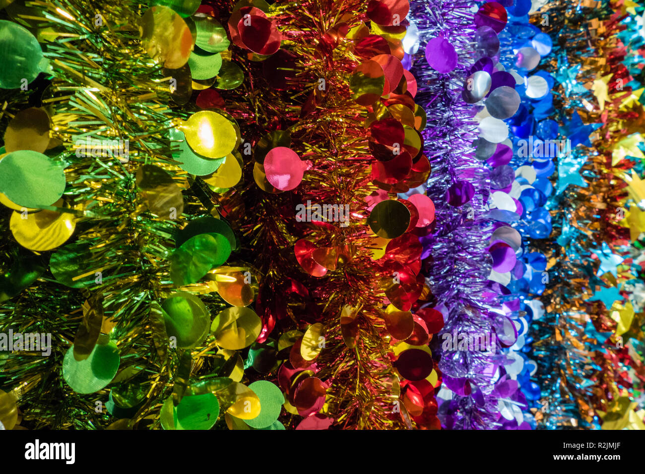 Rows of Christmas tinsel decoration Stock Photo - Alamy