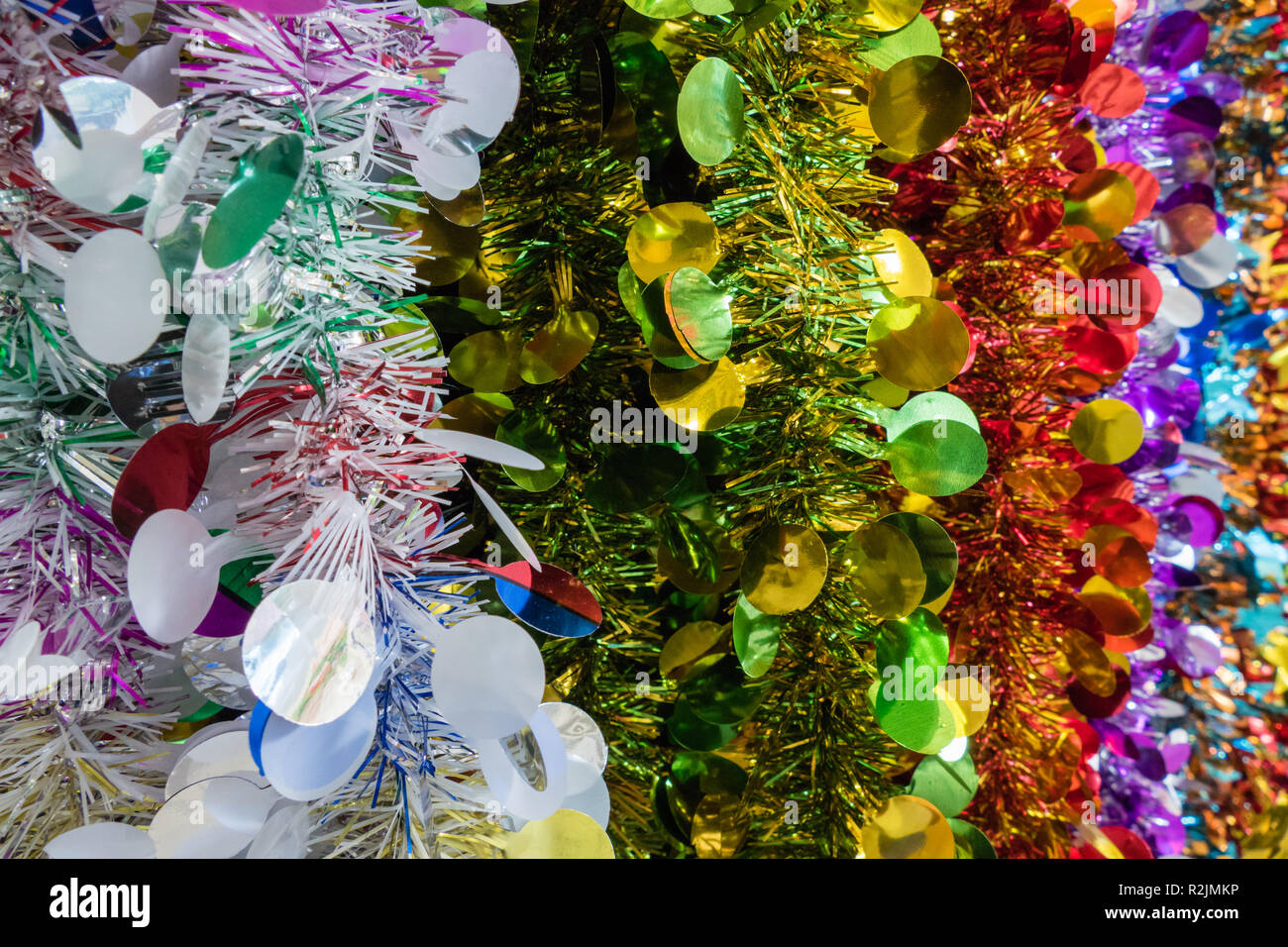 Colorful Christmas tinsel Stock Photo - Alamy
