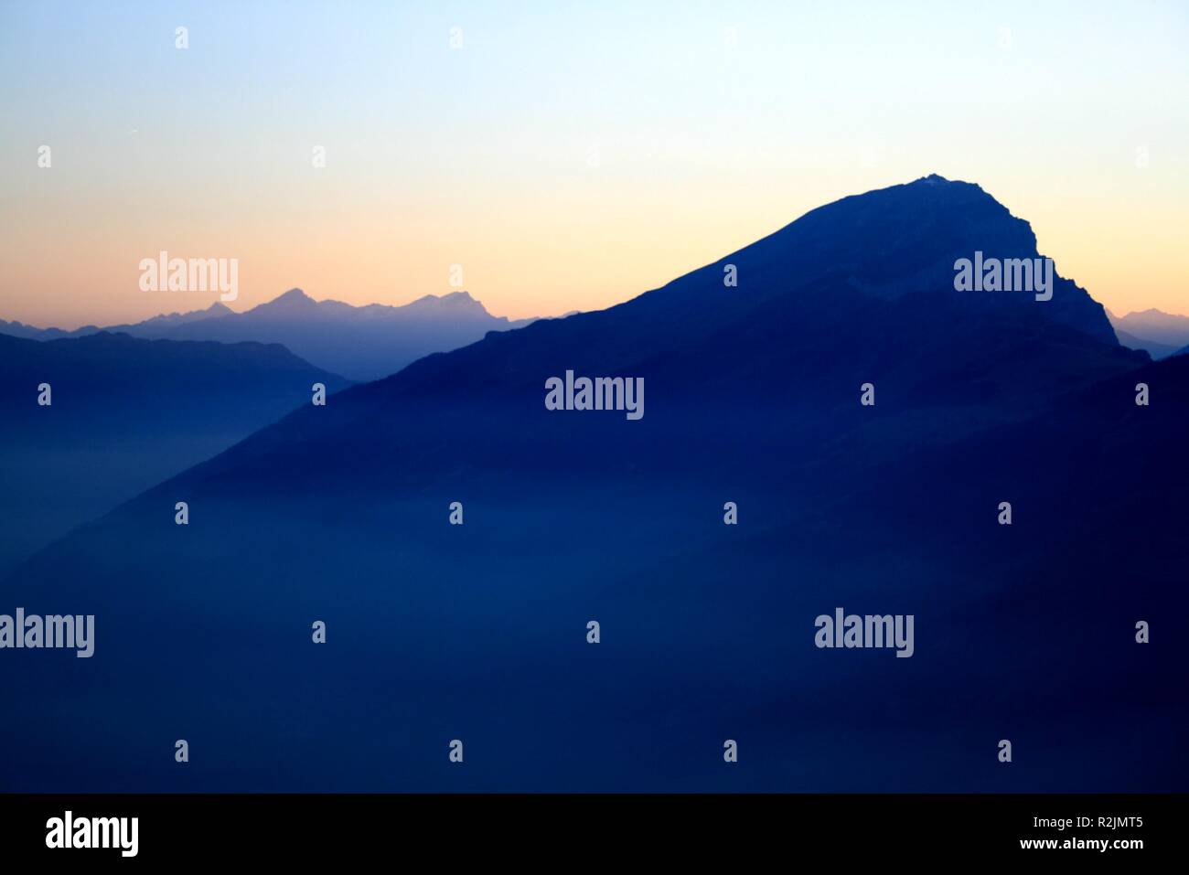 sunset at calanda in switzerland Stock Photo - Alamy