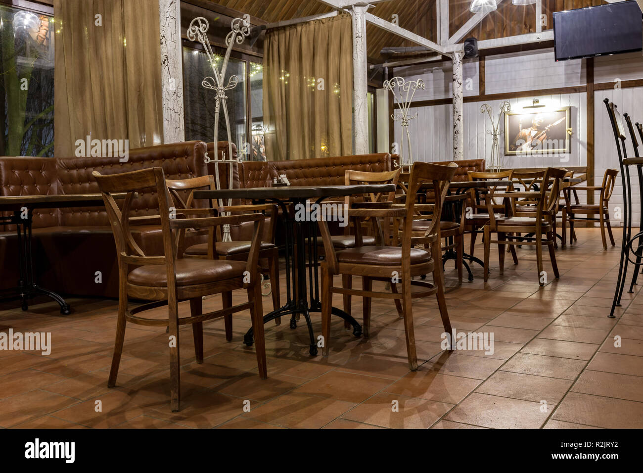 empty restaurant in the evening, a lot of seating for guests. music ...