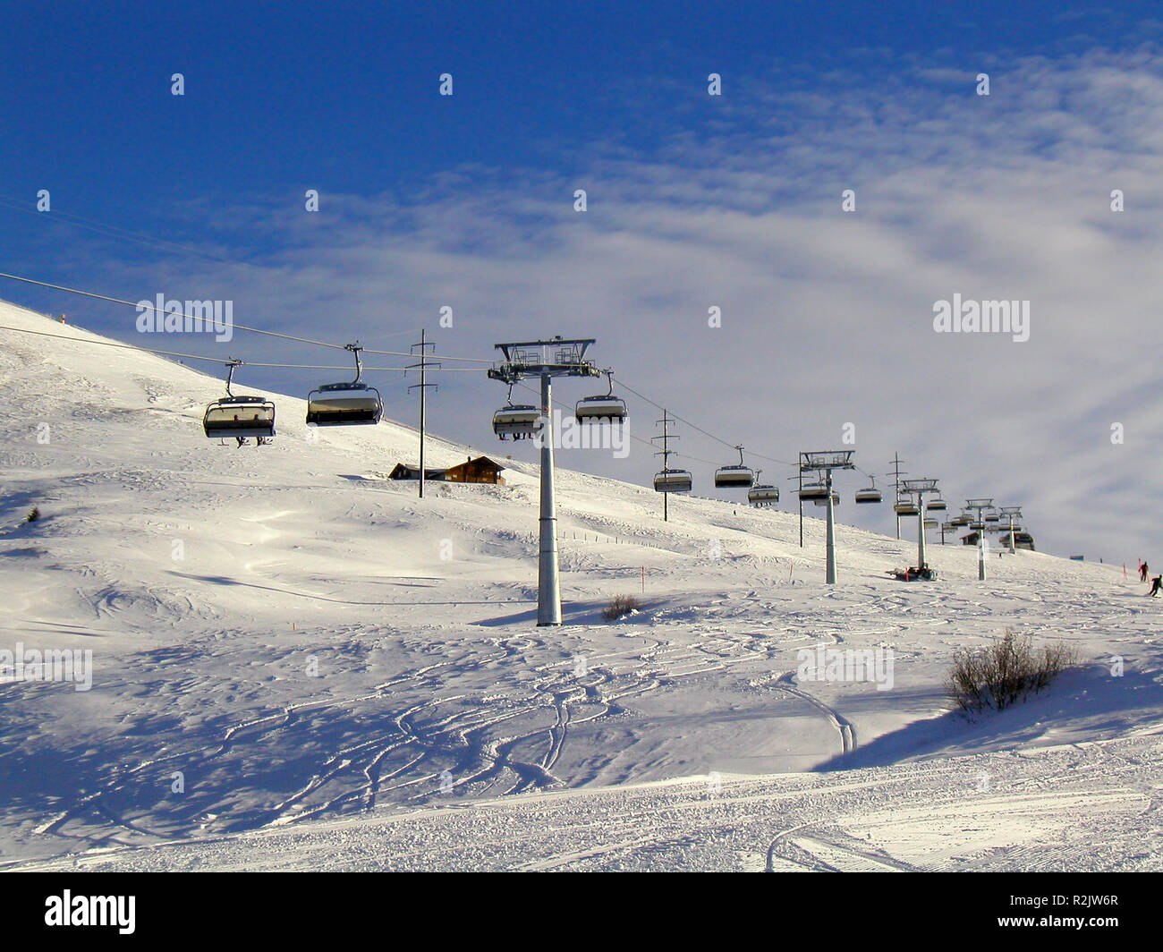 Skiers exit ski lift hi-res stock photography and images - Alamy