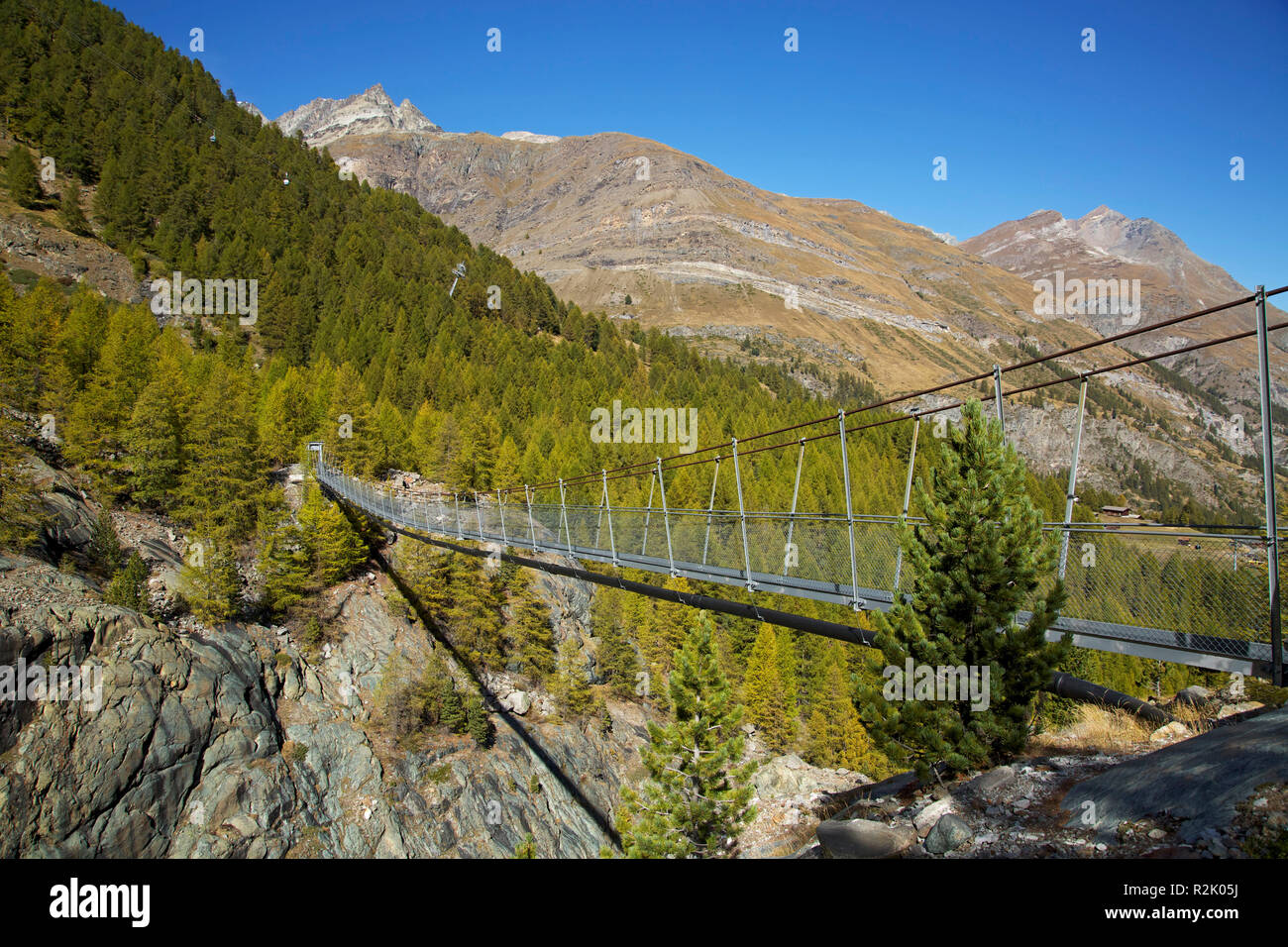 Suspension bridge over the gorner gorge near zermatt hi-res stock ...