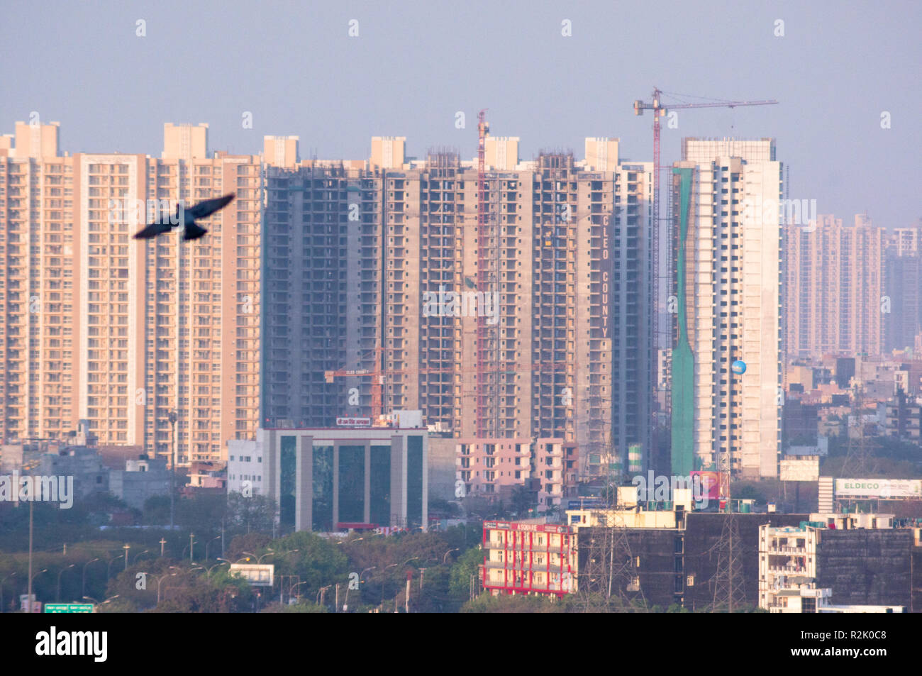 Gurgaon, India - Circa 2018: Aerial shot of skyscraper, houses ...
