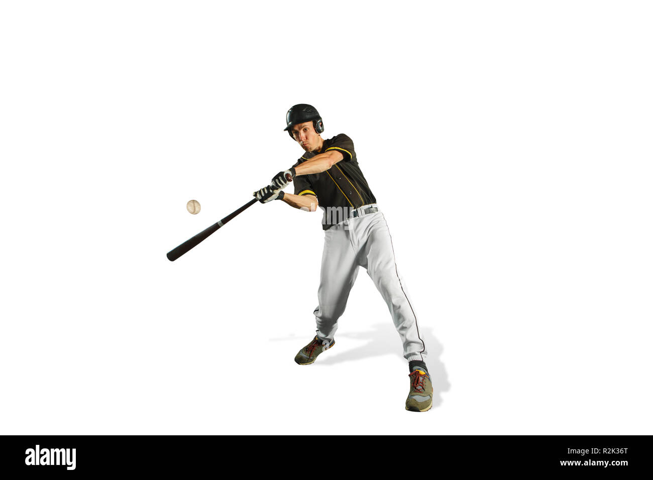 The fit caucasian man baseball player playing in studio. silhouette ...
