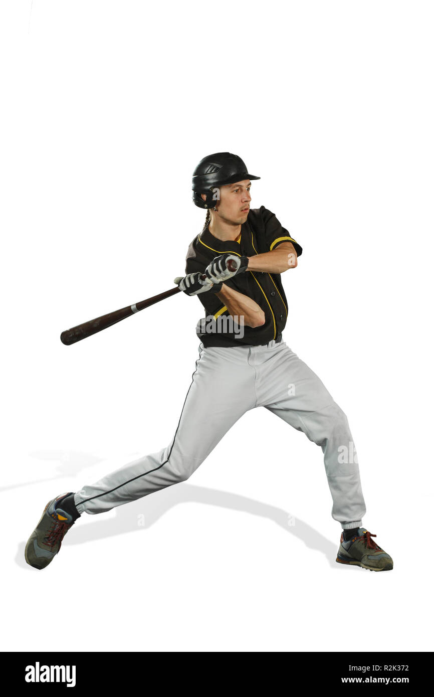 The fit caucasian man baseball player playing in studio. silhouette ...