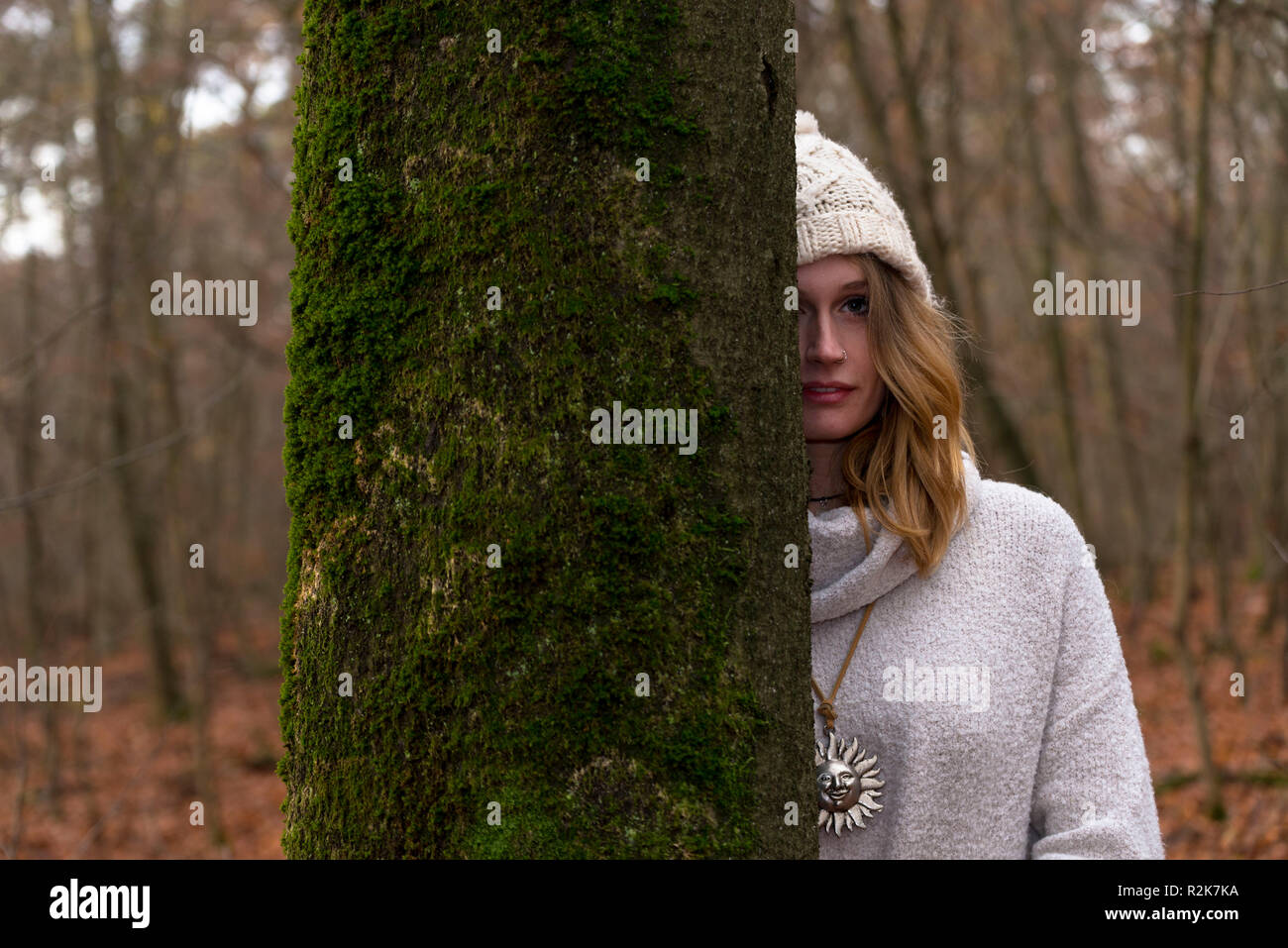 Woman with tree hi-res stock photography and images - Alamy