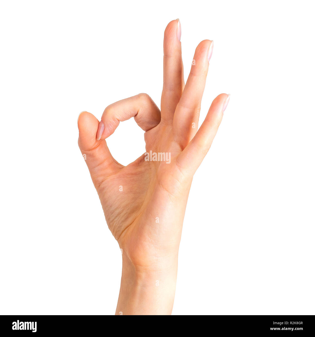 Woman holding hand in gesture of okay or letter O. Sign of success or ...