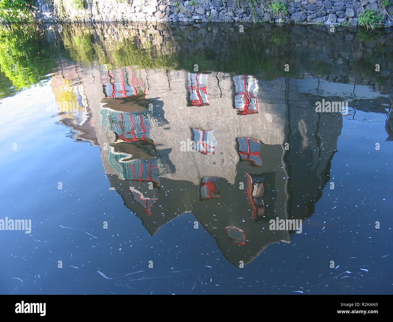 colorful house front with water reflection Stock Photo - Alamy