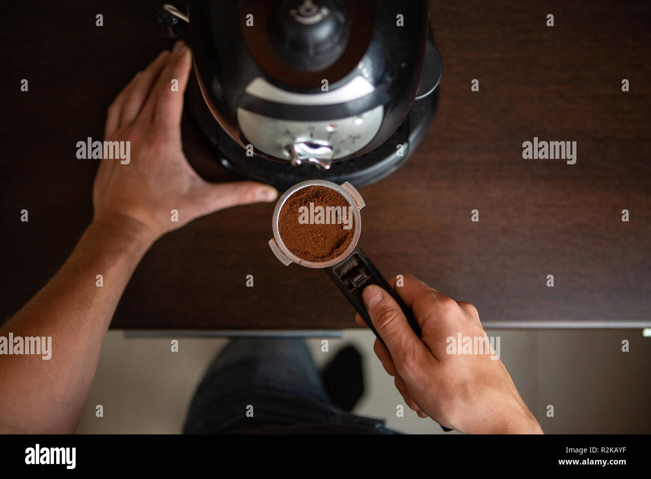 Photo of coffee maker, man hand pouring coffee Stock Photo - Alamy