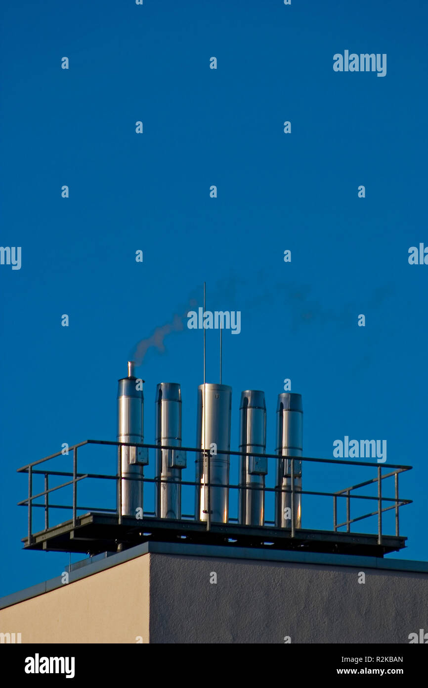 Sheet metal roof chimneys hi-res stock photography and images - Alamy