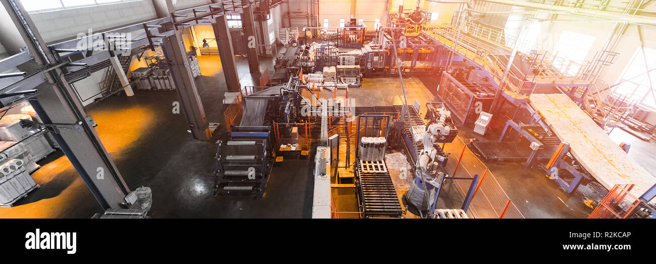 Fiberglass production industry equipment at manufacture background ...