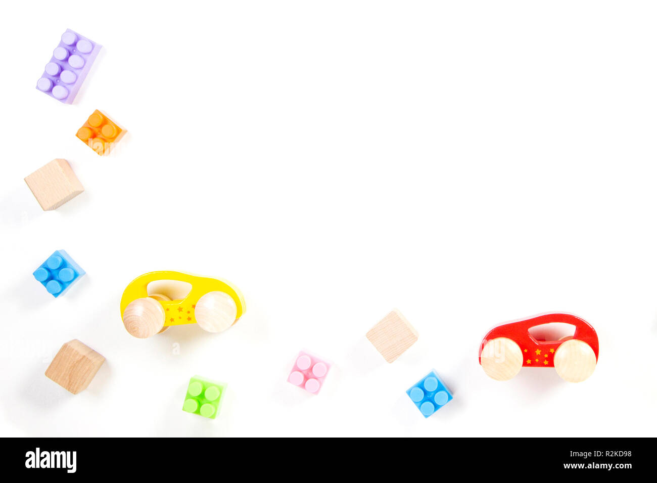 Wooden toy cars and colorful cubes and blocks on white background Stock ...