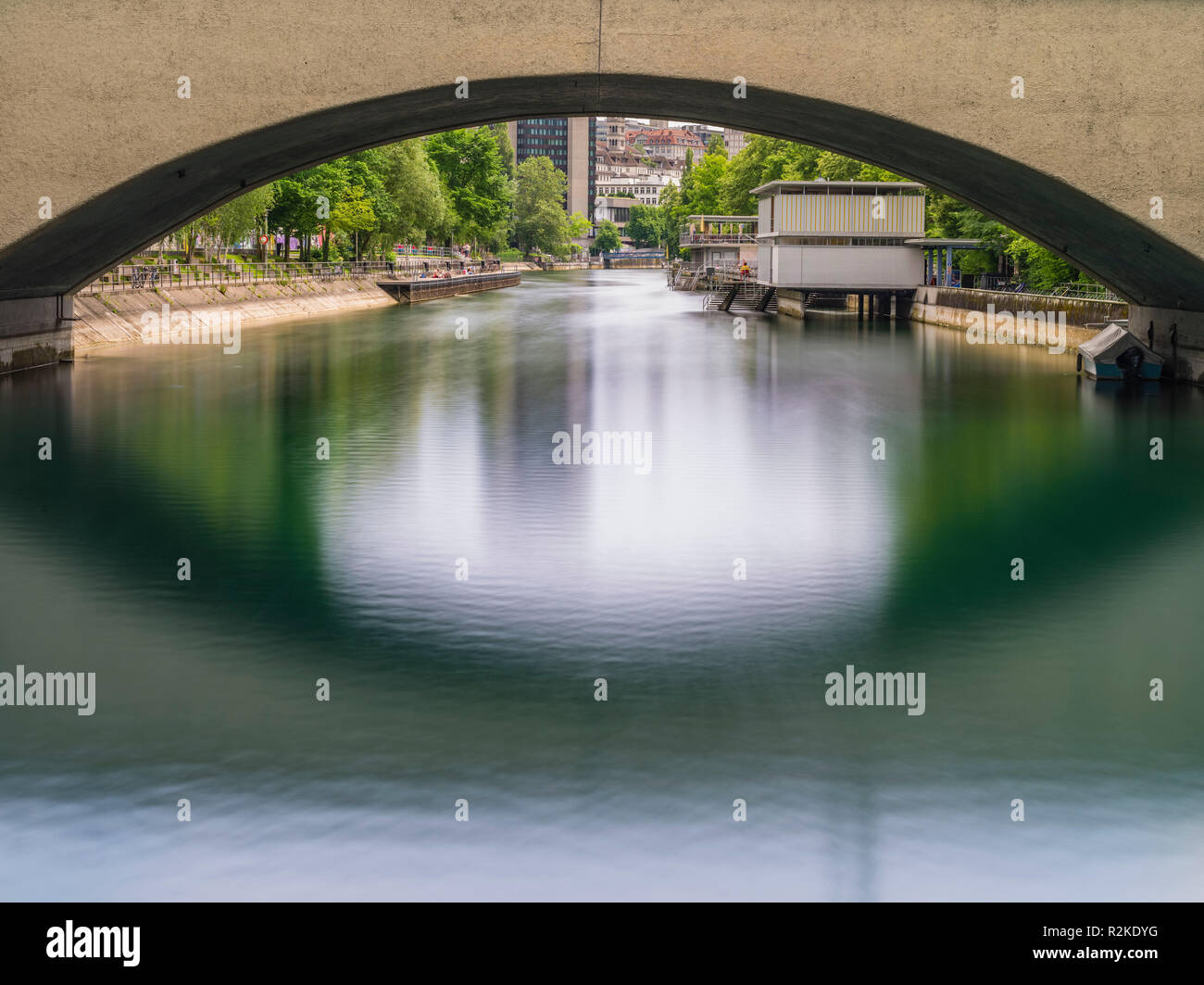 Bridge arch over the Limmat with view of the swimming pool Oberer ...
