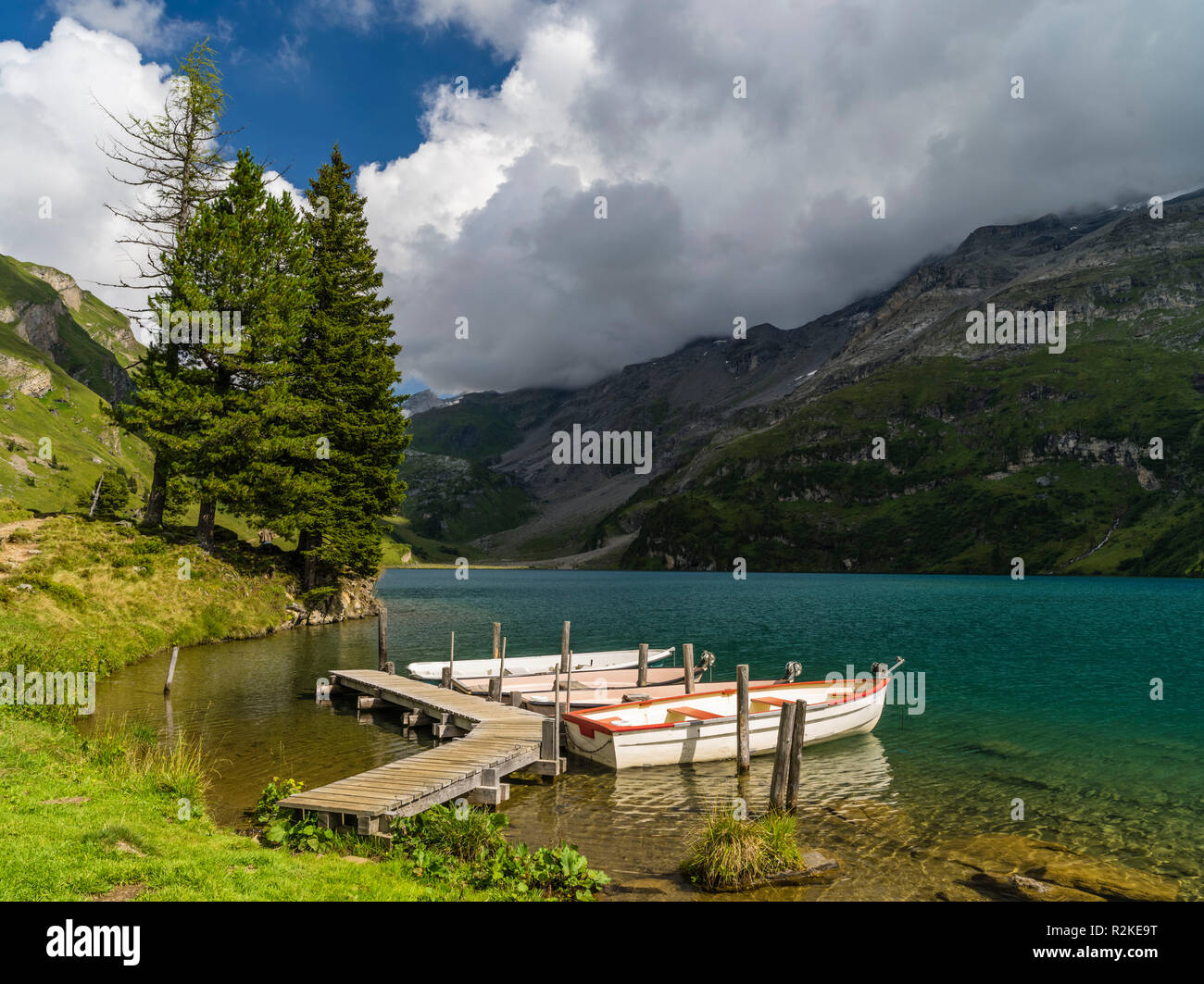 Rowing boats on the Engstlensee in Bernese Oberland Stock Photo - Alamy