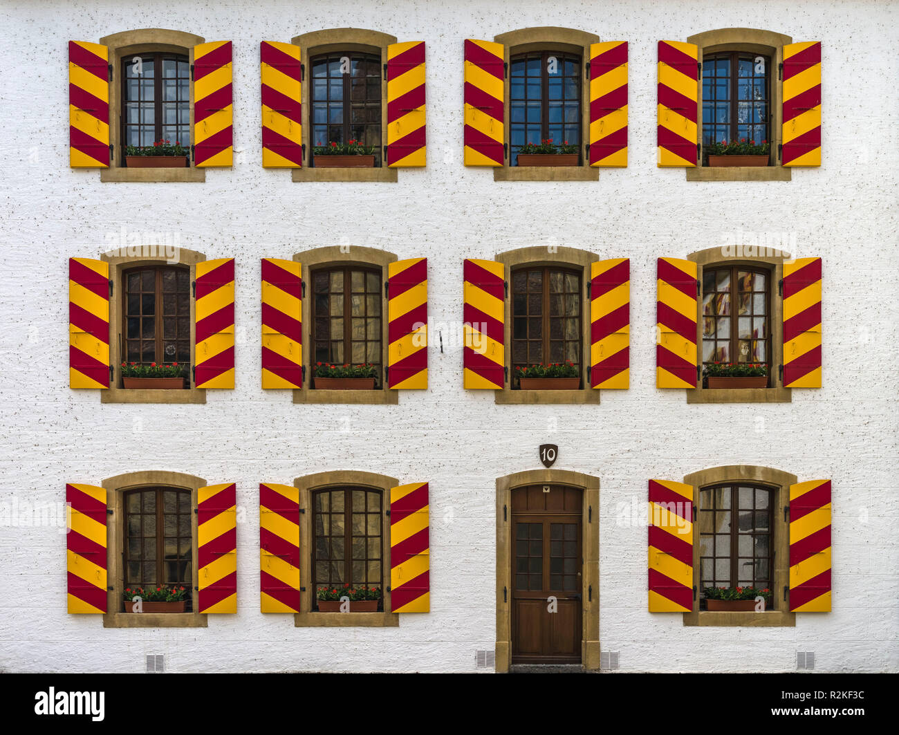 Neuchâtel Castle Courtyard with colorful shutters Stock Photo - Alamy