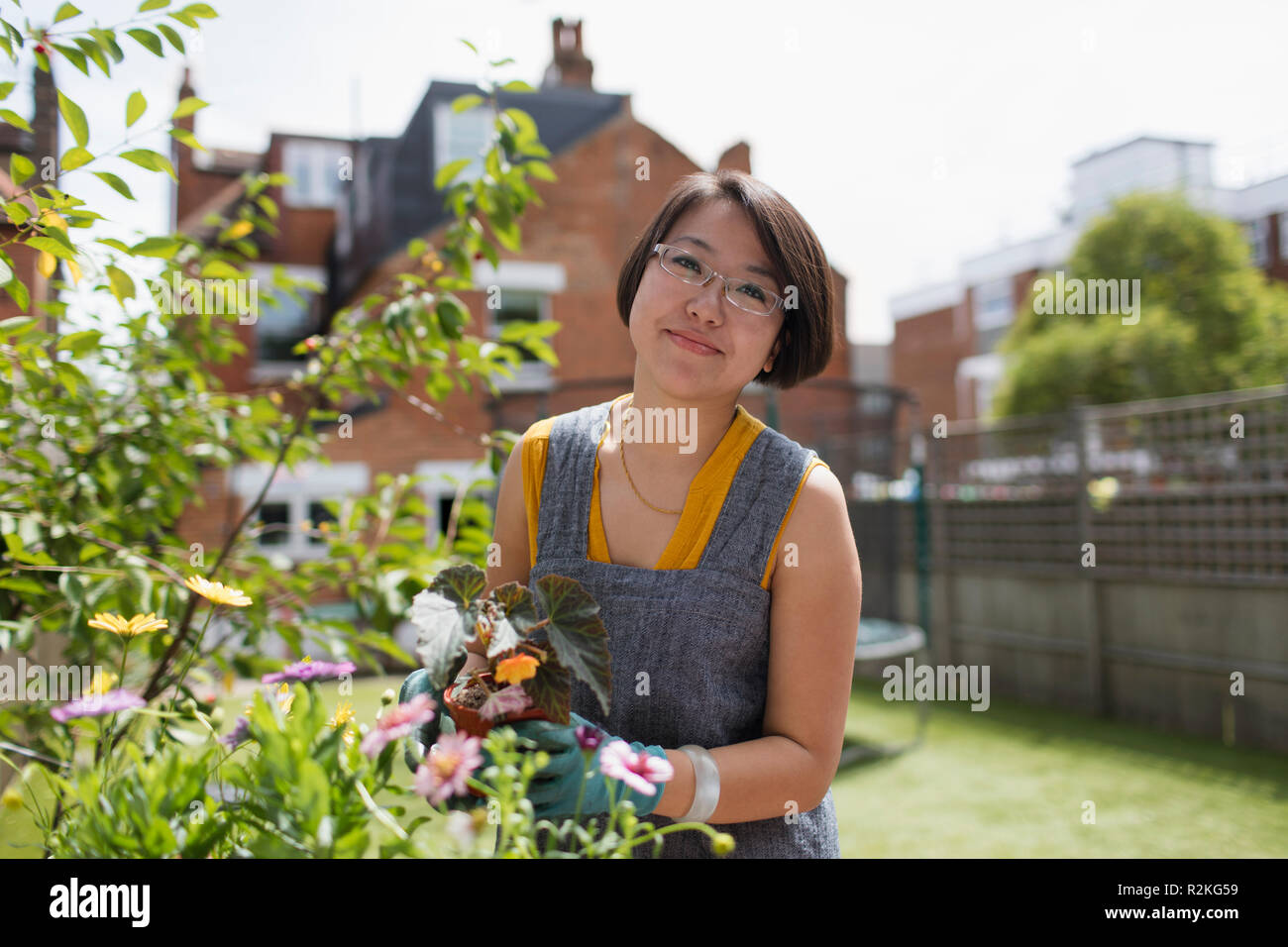 Back view of woman gardening hi-res stock photography and images - Alamy