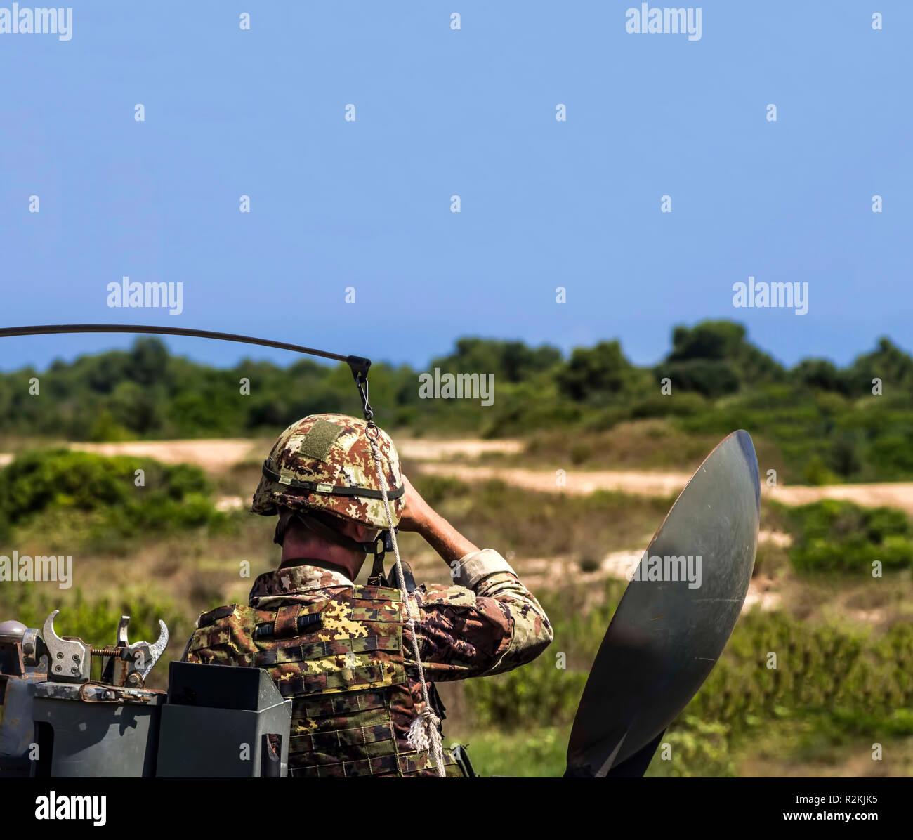 a military watching with binoculars the view Stock Photo - Alamy