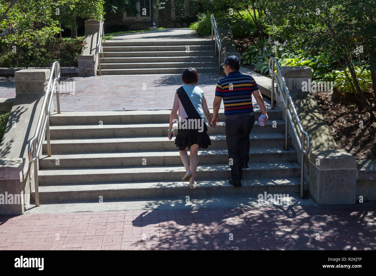 Couple on Steps Stock Photo - Alamy