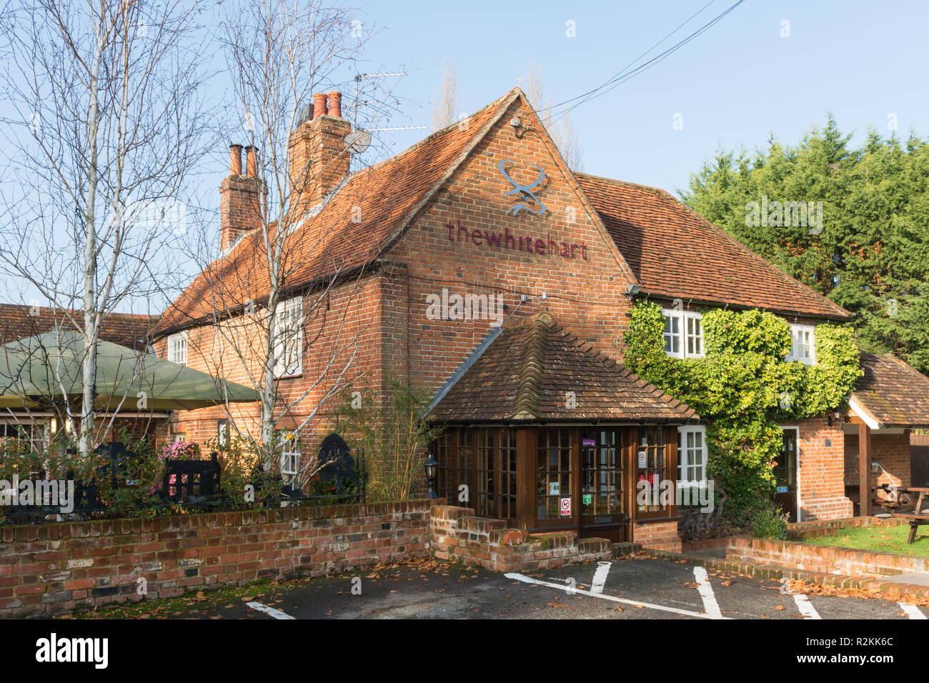 The White Hart pub, public house, in Wood Street Village in Surrey, UK ...