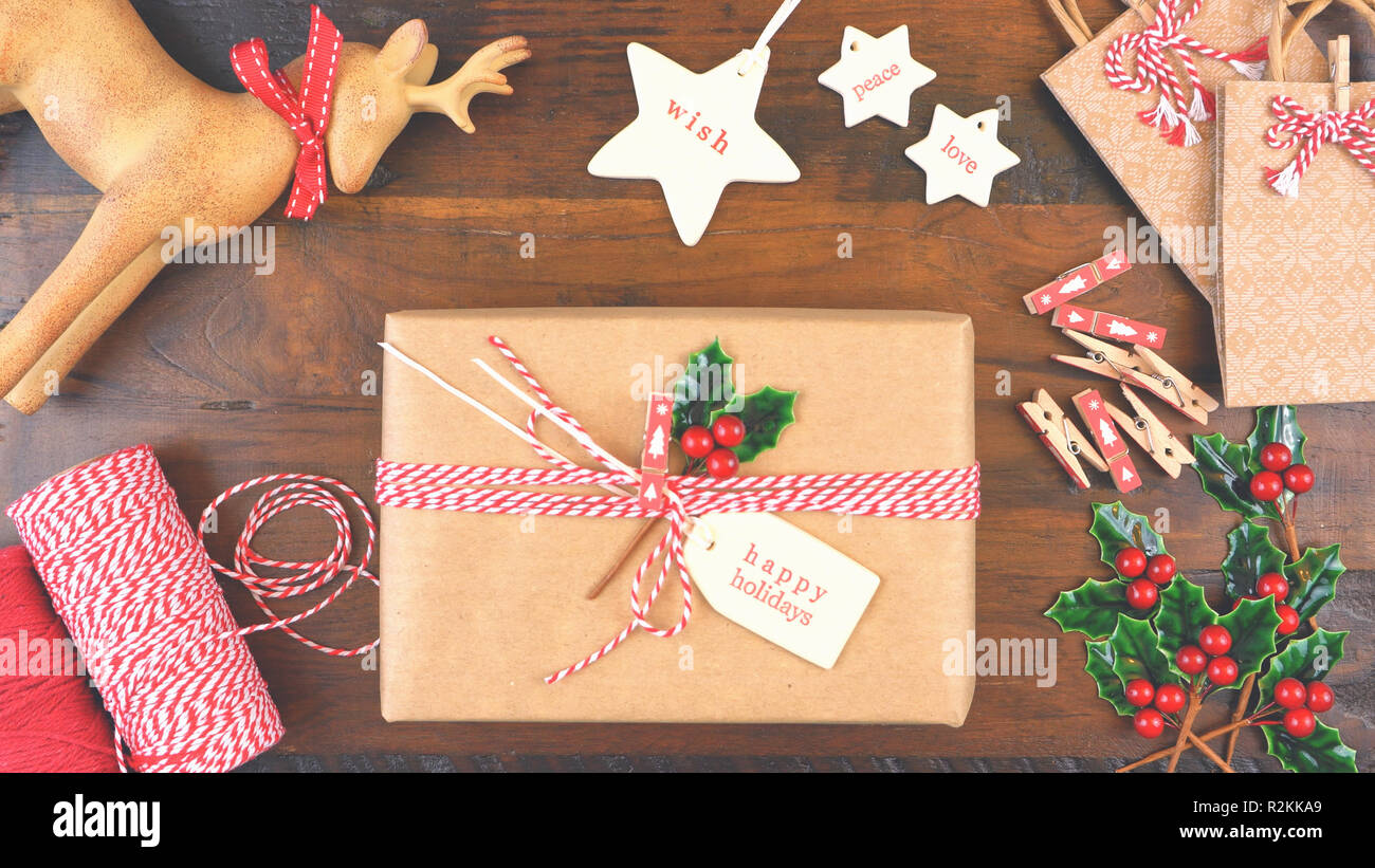 Christmas gift wrapping overhead in rustic theme with brown Kraft paper ...