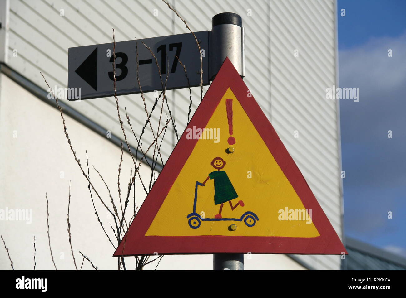 Children playing sign warning painted hi-res stock photography and ...