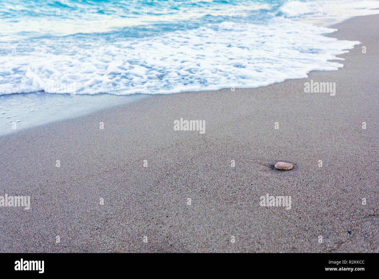 Blue waves in the sand Stock Photo - Alamy