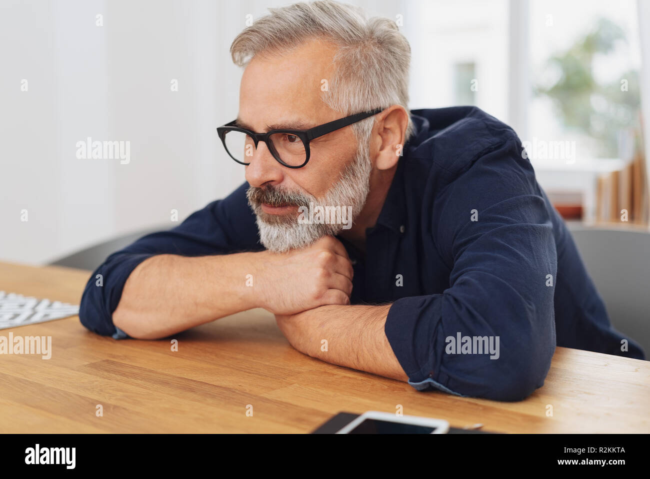 Leans on hands hi-res stock photography and images - Alamy