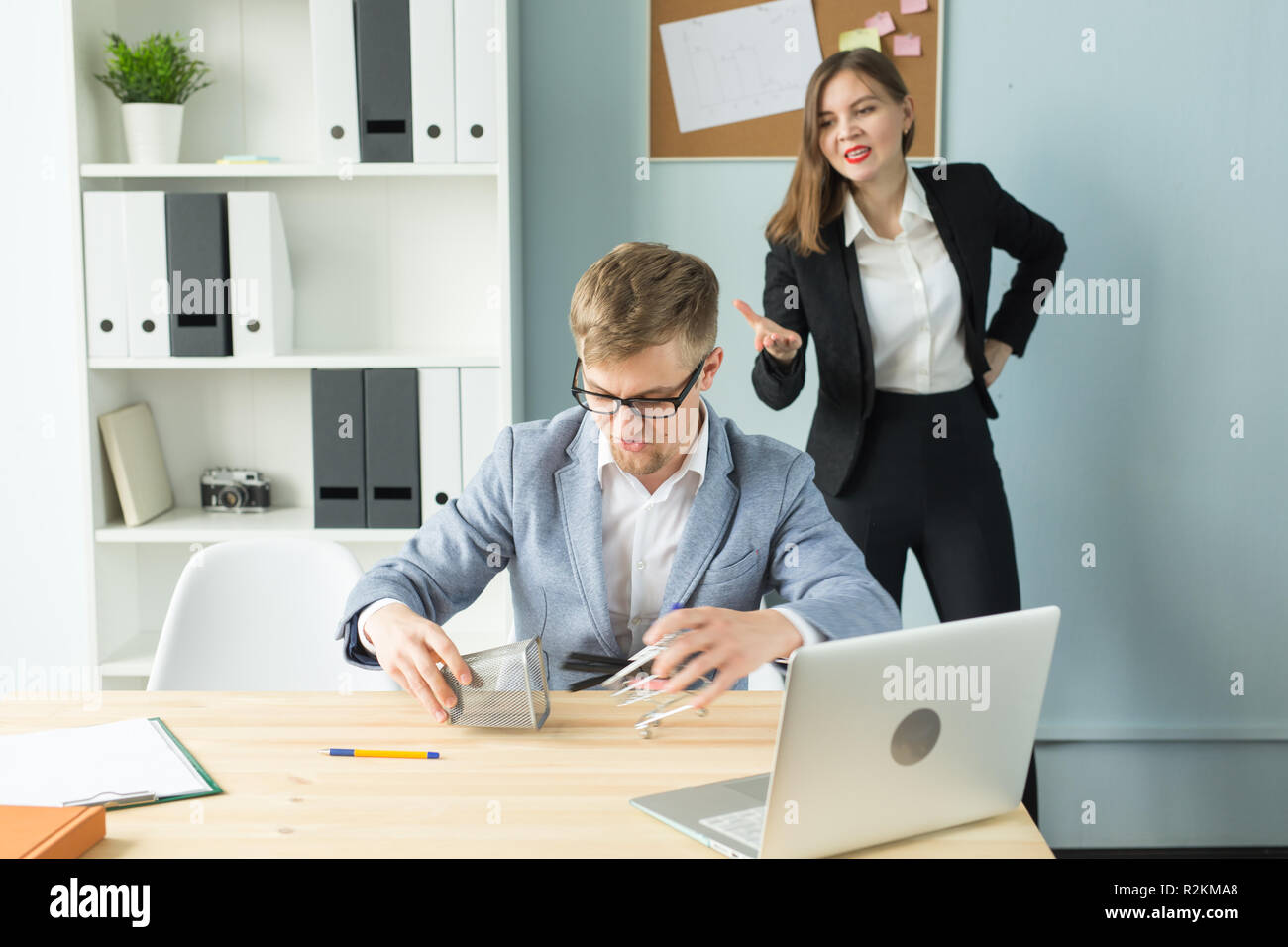 Business, emotions and people concept - Disgruntled boss watch as the ...