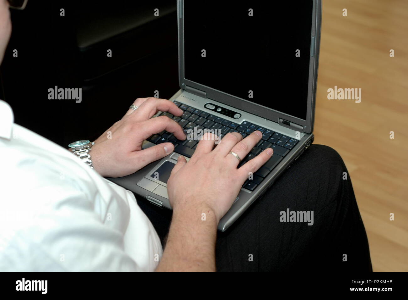 hands on laptop Stock Photo - Alamy