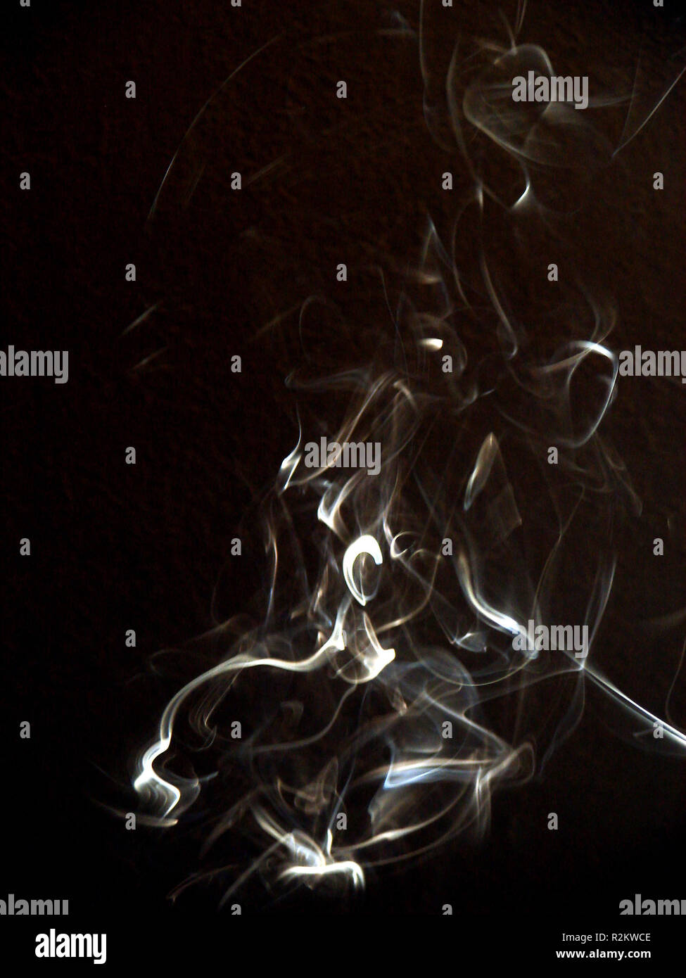 dissolved in smoke Stock Photo - Alamy