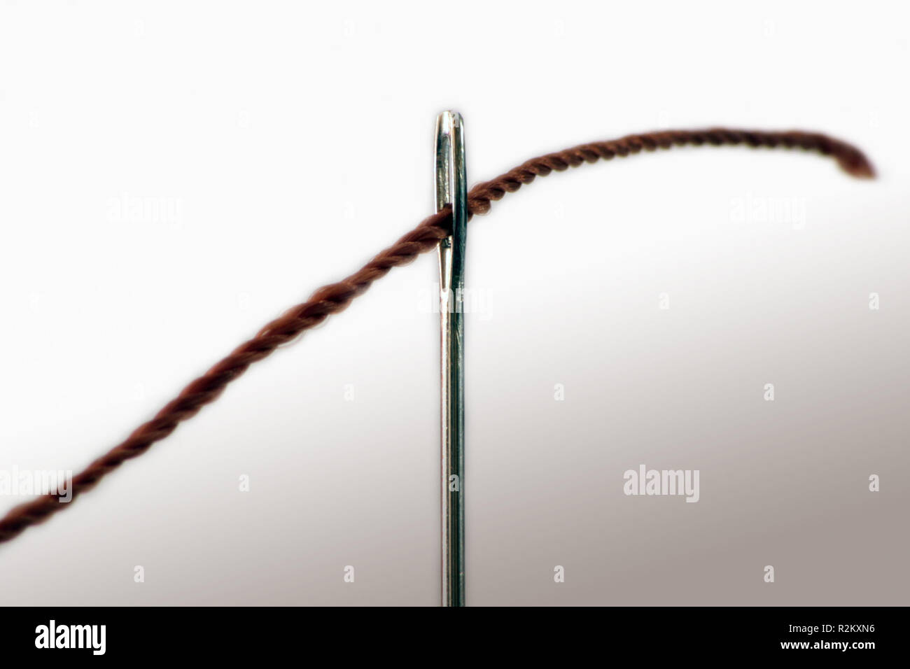 needle and thread Stock Photo - Alamy