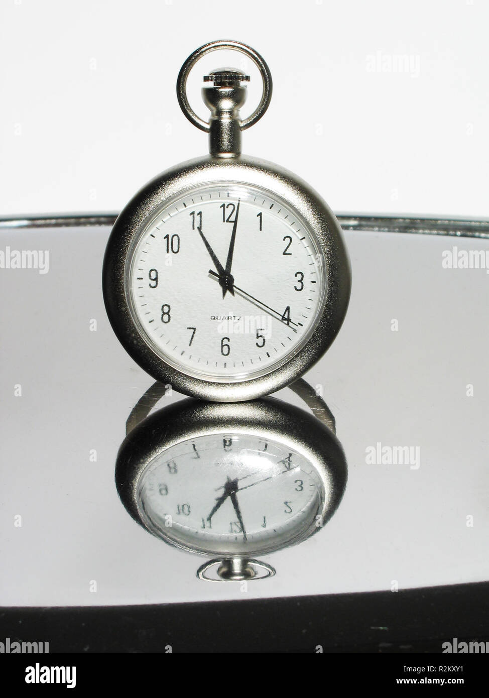 pocket watch on silver tray Stock Photo - Alamy