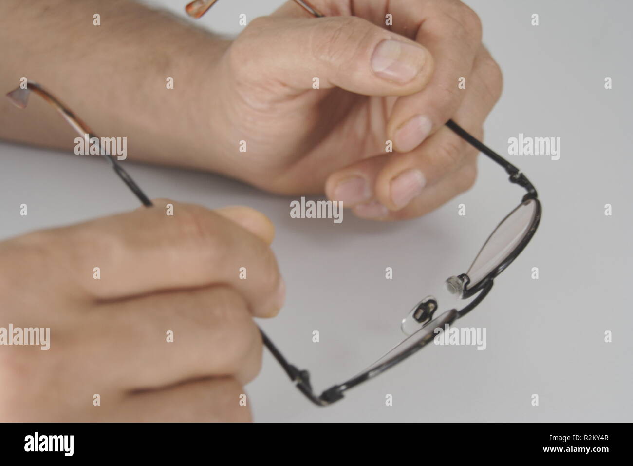 men hands with glasses Stock Photo - Alamy