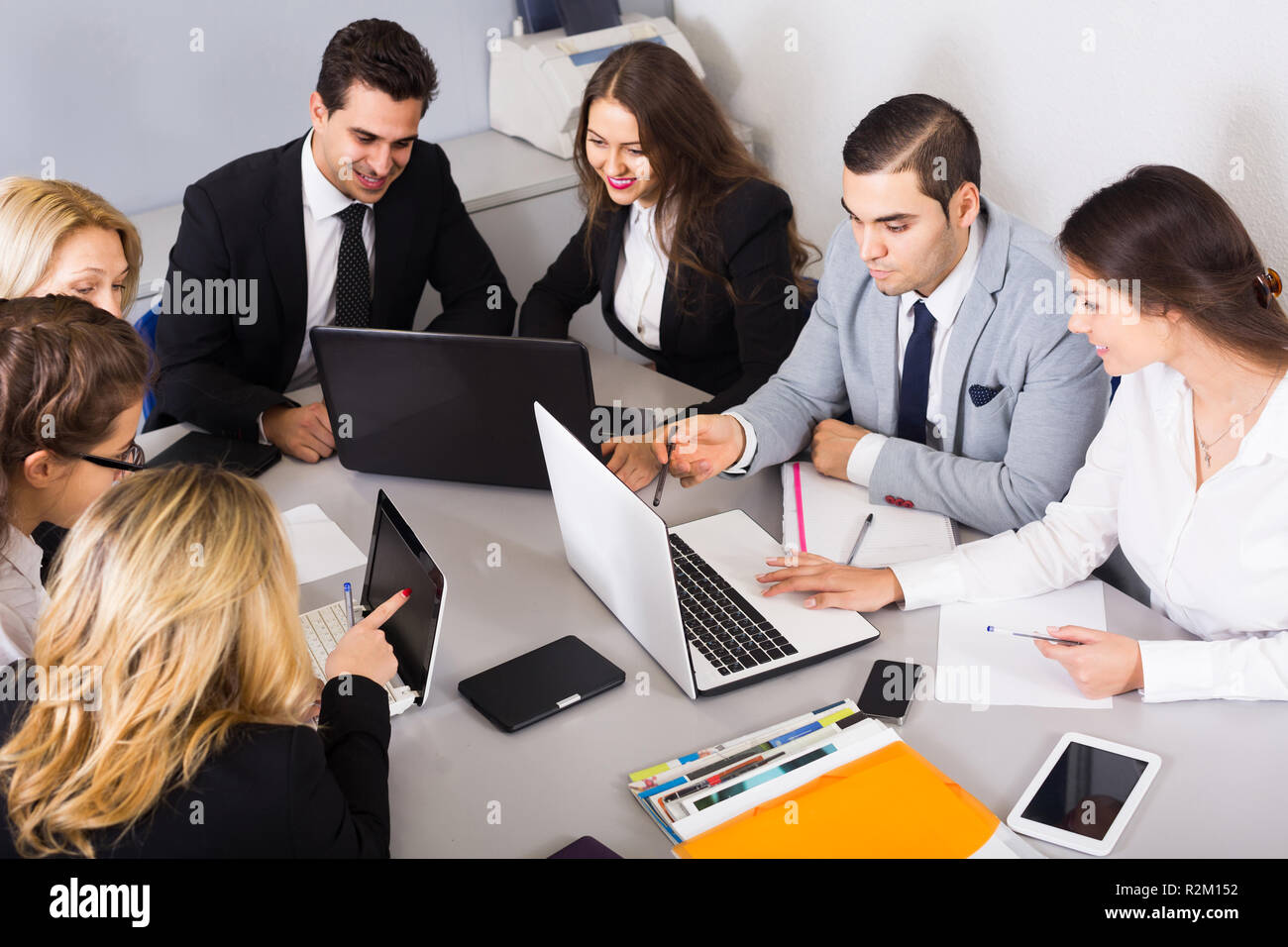 Chief with professional adult european officials discussing preparing ...