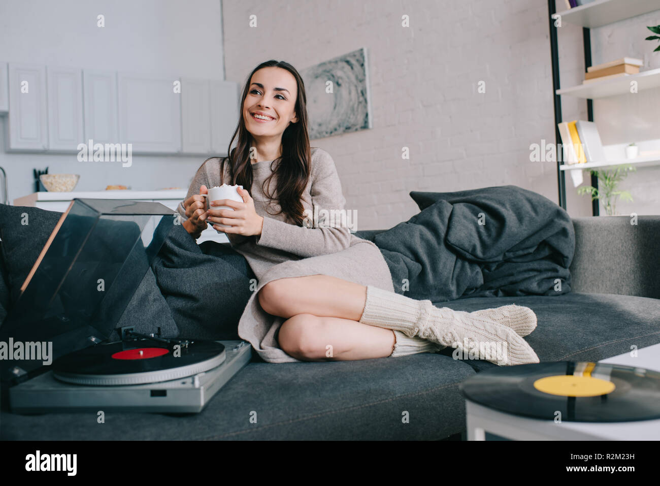 Female record record player hi-res stock photography and images - Alamy