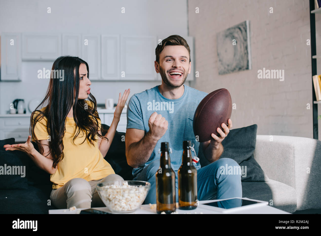 Woman yelling at tv hi-res stock photography and images - Alamy