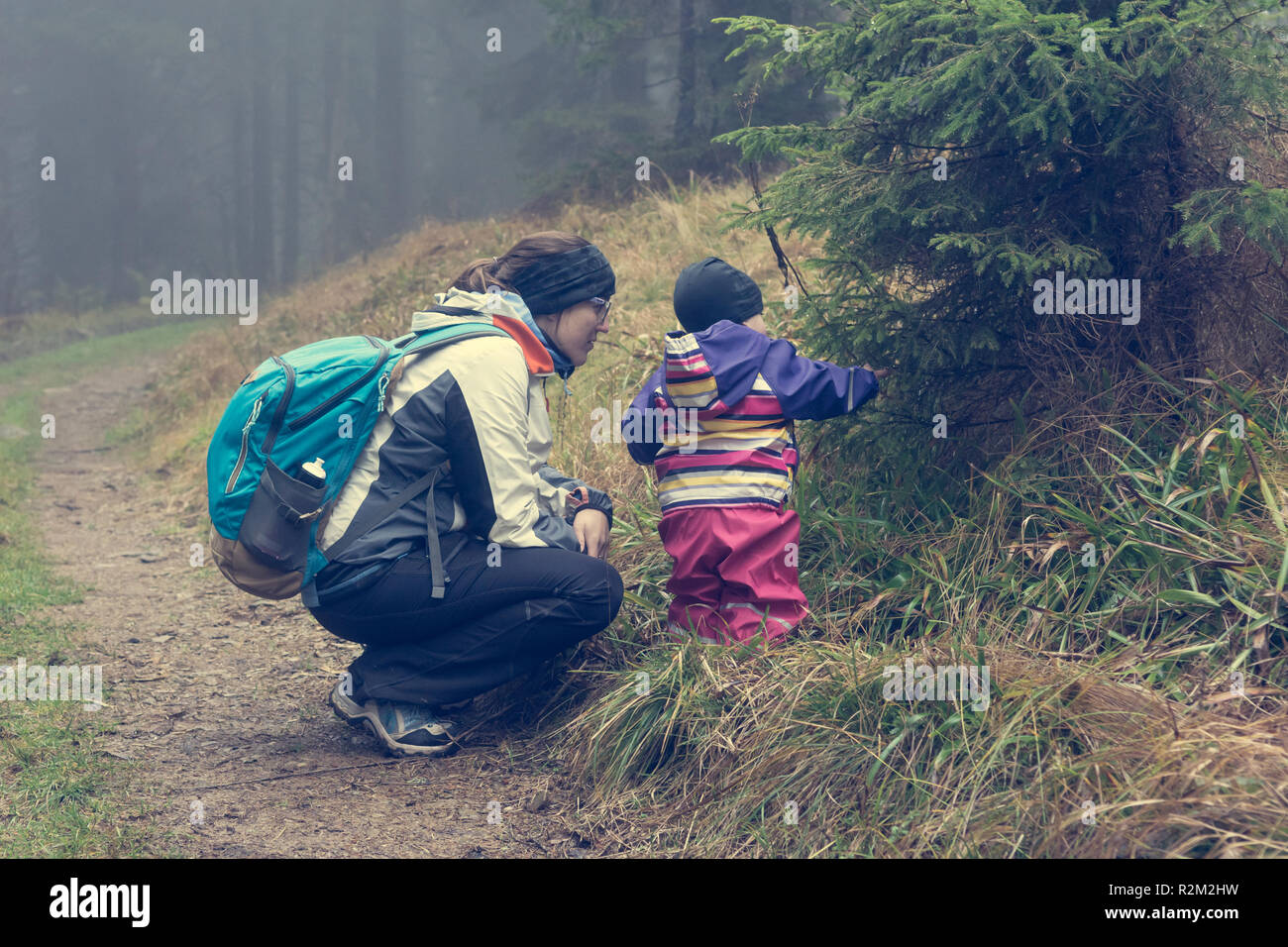 Active mother exploring nature with her daughter Stock Photo - Alamy