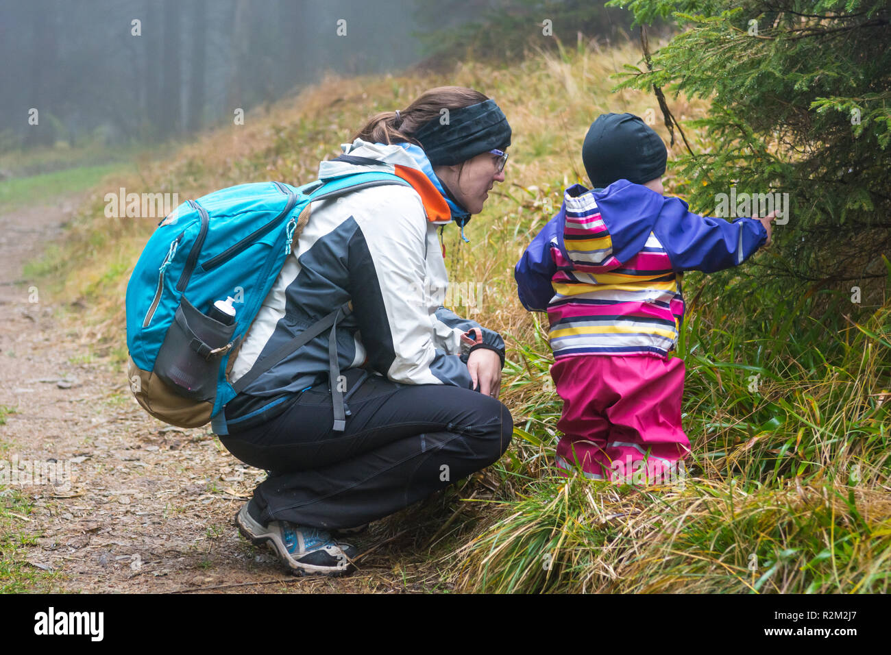 Active mother exploring nature with her daughter Stock Photo - Alamy