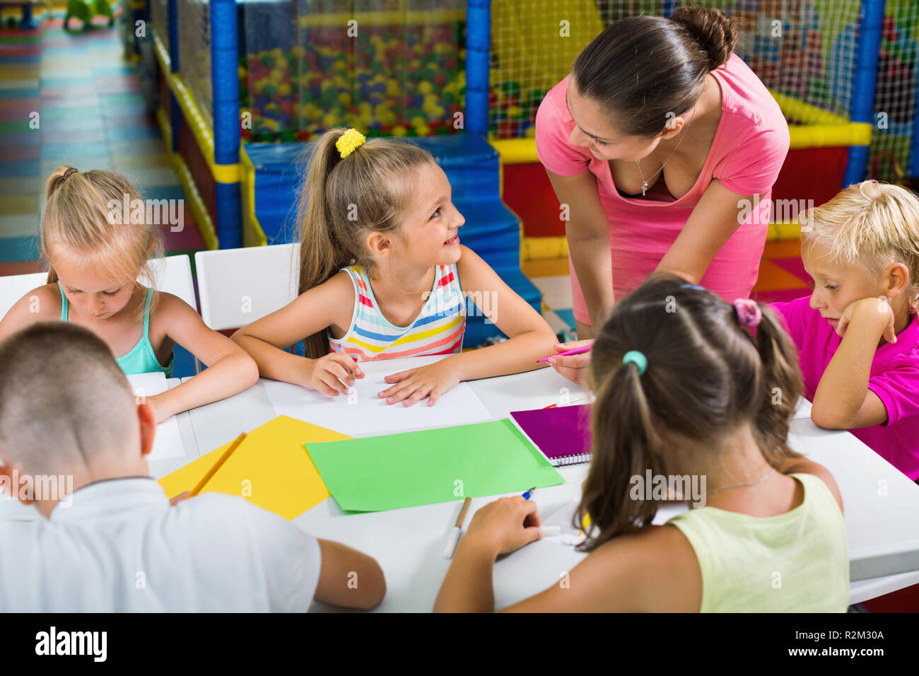 Happy diligent kids drawing hi-res stock photography and images - Alamy