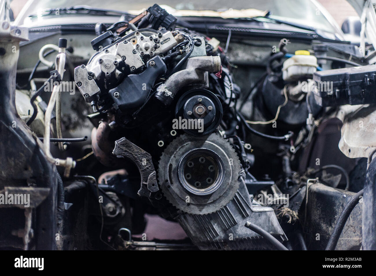 Legendary modern sport engine in car with open hood and raw parts Stock ...