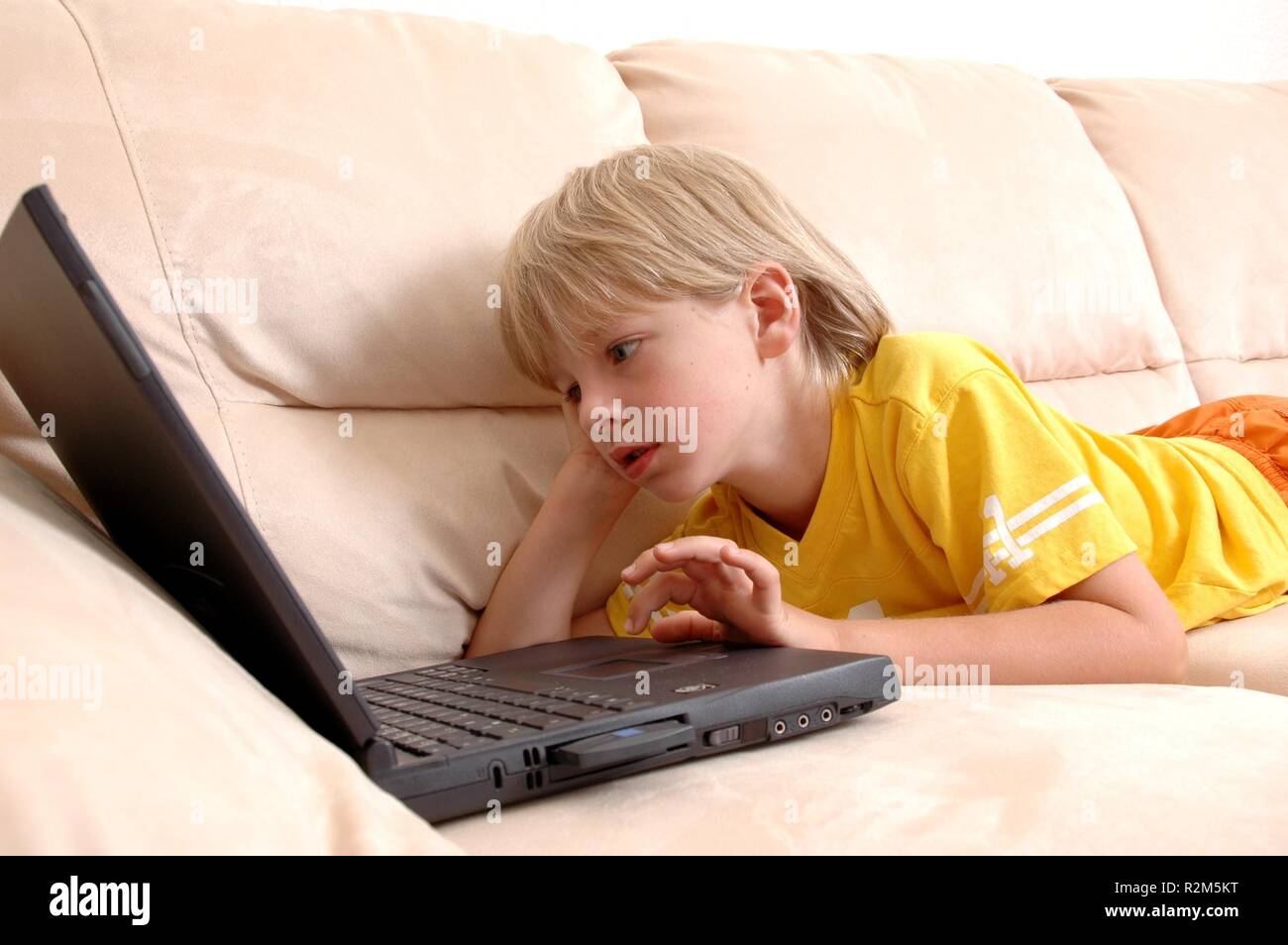 boy on laptop Stock Photo - Alamy
