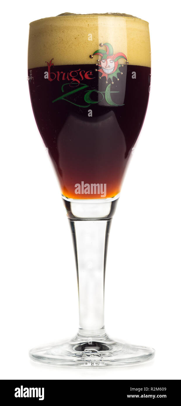 Glass of Brugse Zot Dubbel beer isolated on a white background Stock ...