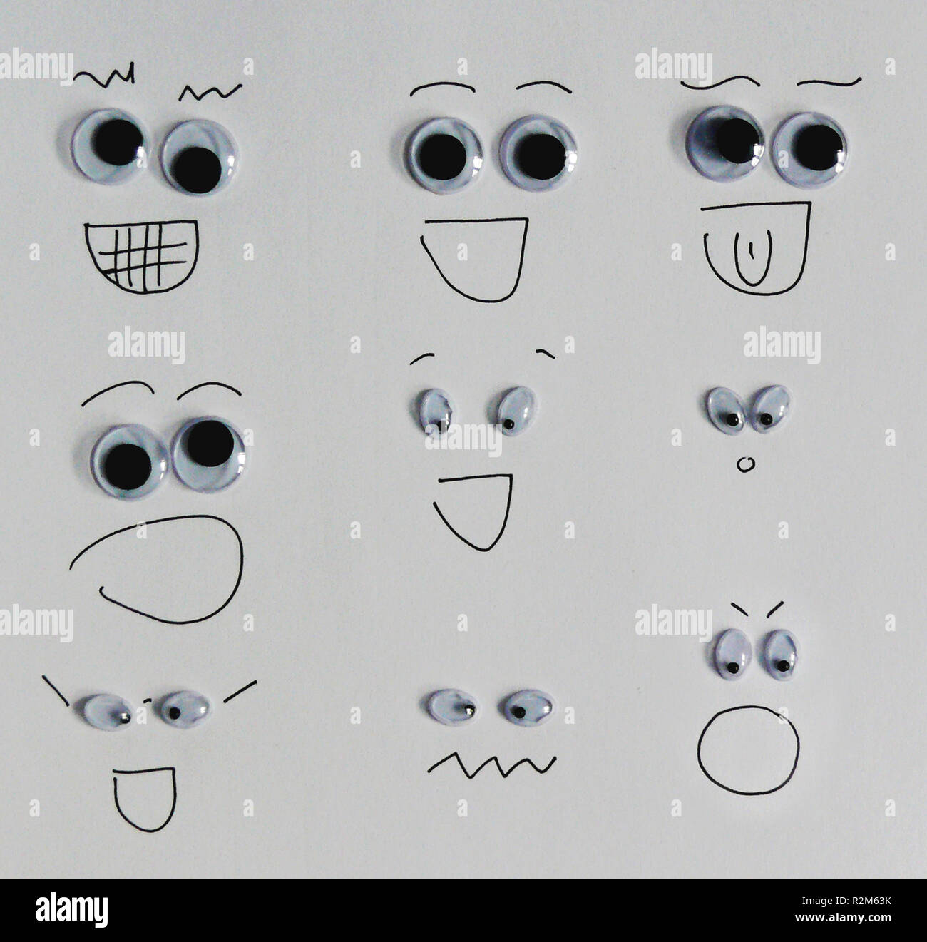 Smiling and crying faces hi-res stock photography and images - Alamy