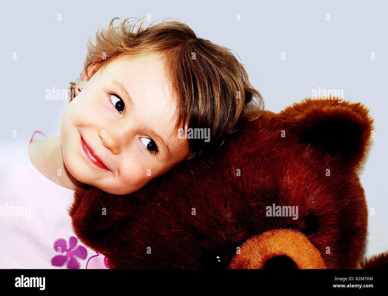 Smiling mischievously hi-res stock photography and images - Alamy
