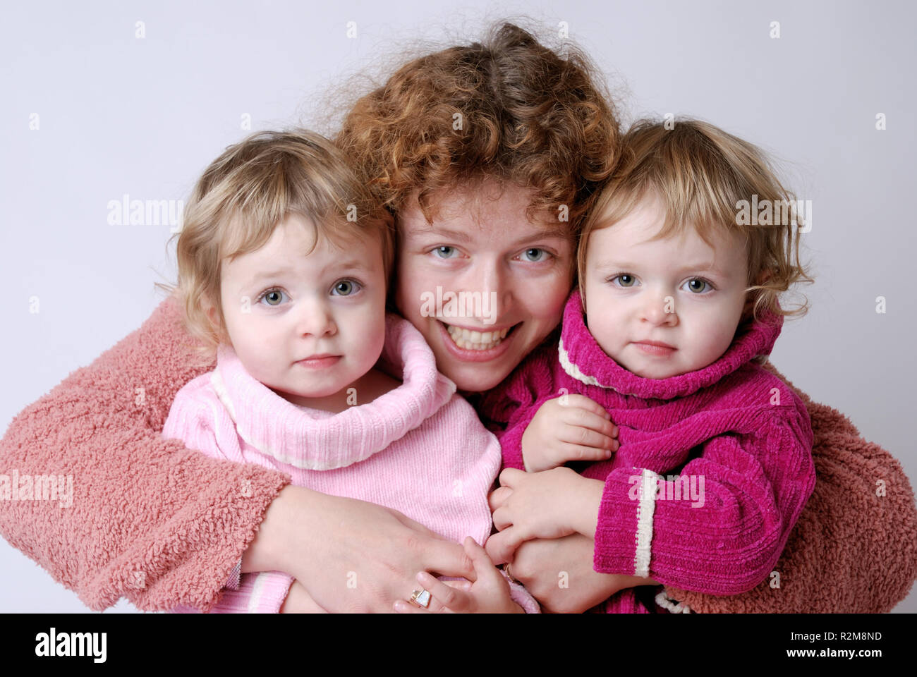 mother with twins Stock Photo - Alamy
