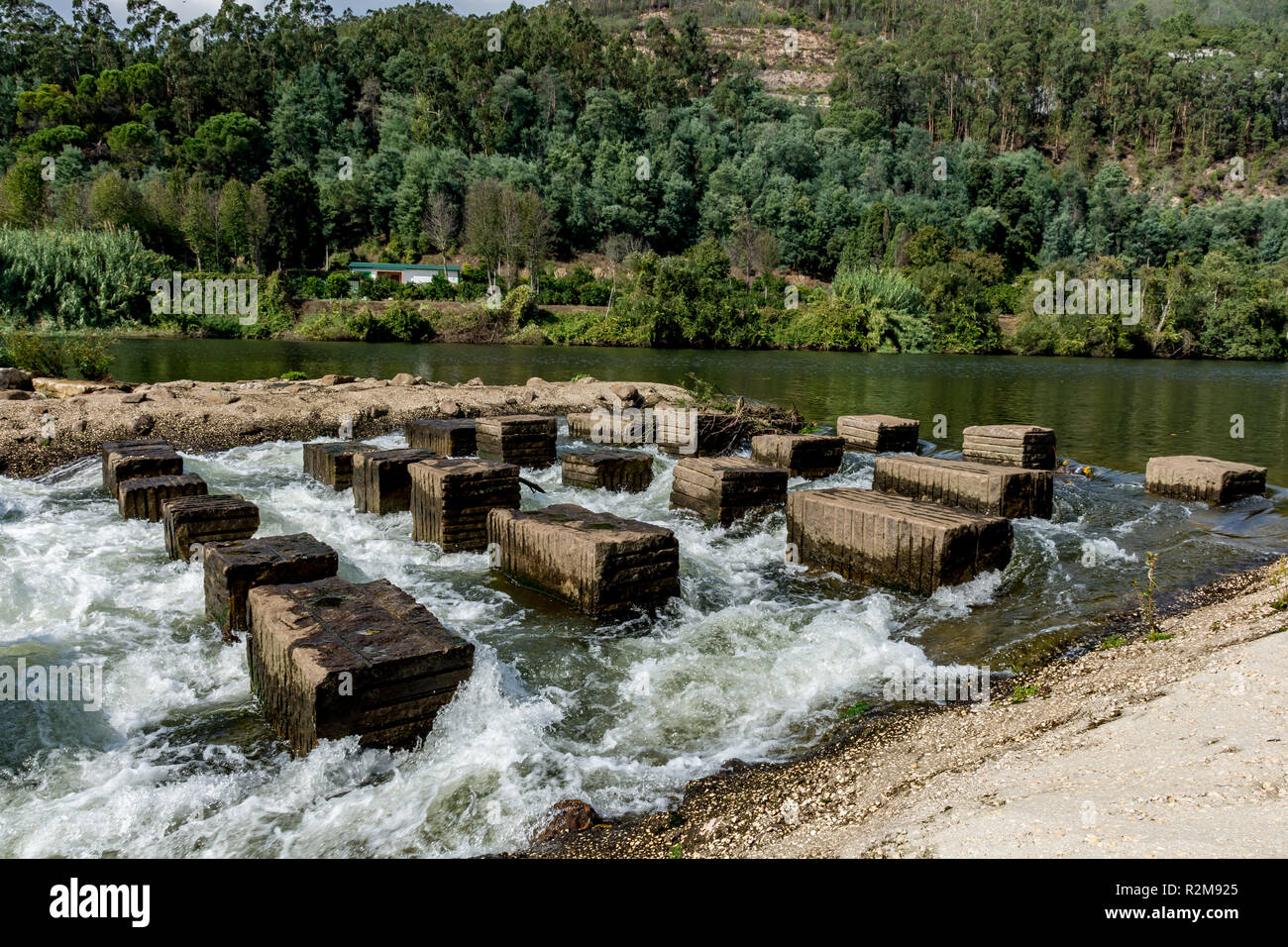 Rock ramp fish pass on the Rio Mondego in Portugal, installed to allow ...
