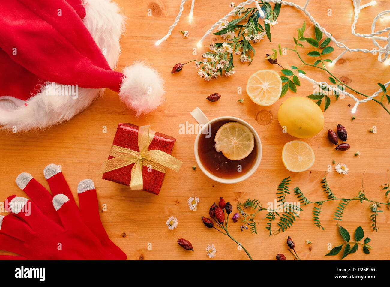 Christmas holiday flat lay top view with Santa Claus hat, present gift ...