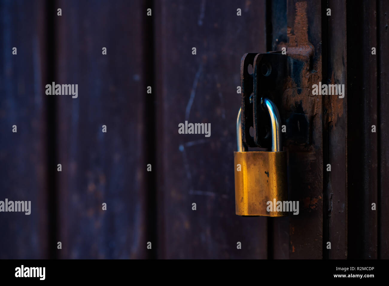 Gate locked with padlock, security and private property protection ...